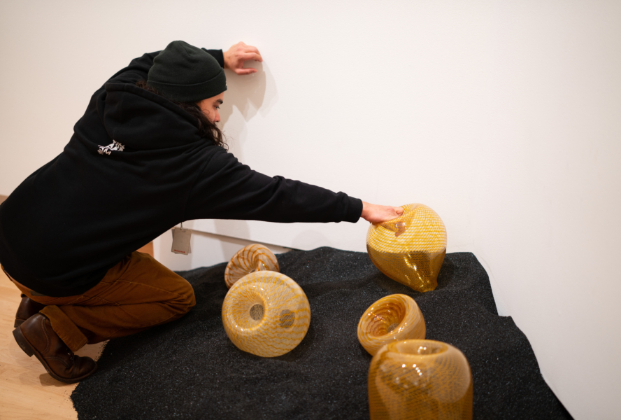 "Momentum" artist Trenton Quiocho installs "Trapped" - Tacoma Art Museum
