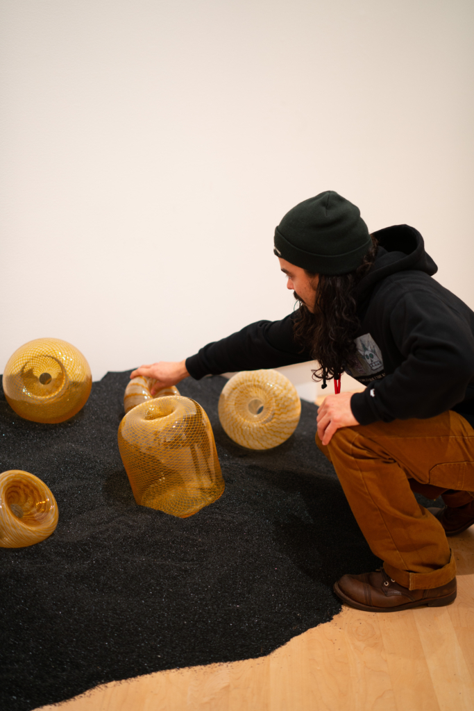 "Momentum" artist Trenton Quiocho installs "Trapped" - Tacoma Art Museum
